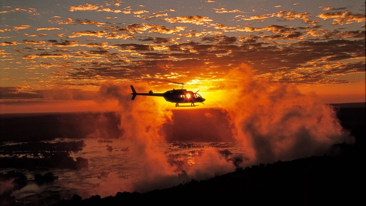 What to Expect on a Helicopter Tour Over Victoria Falls - Zambezi ...